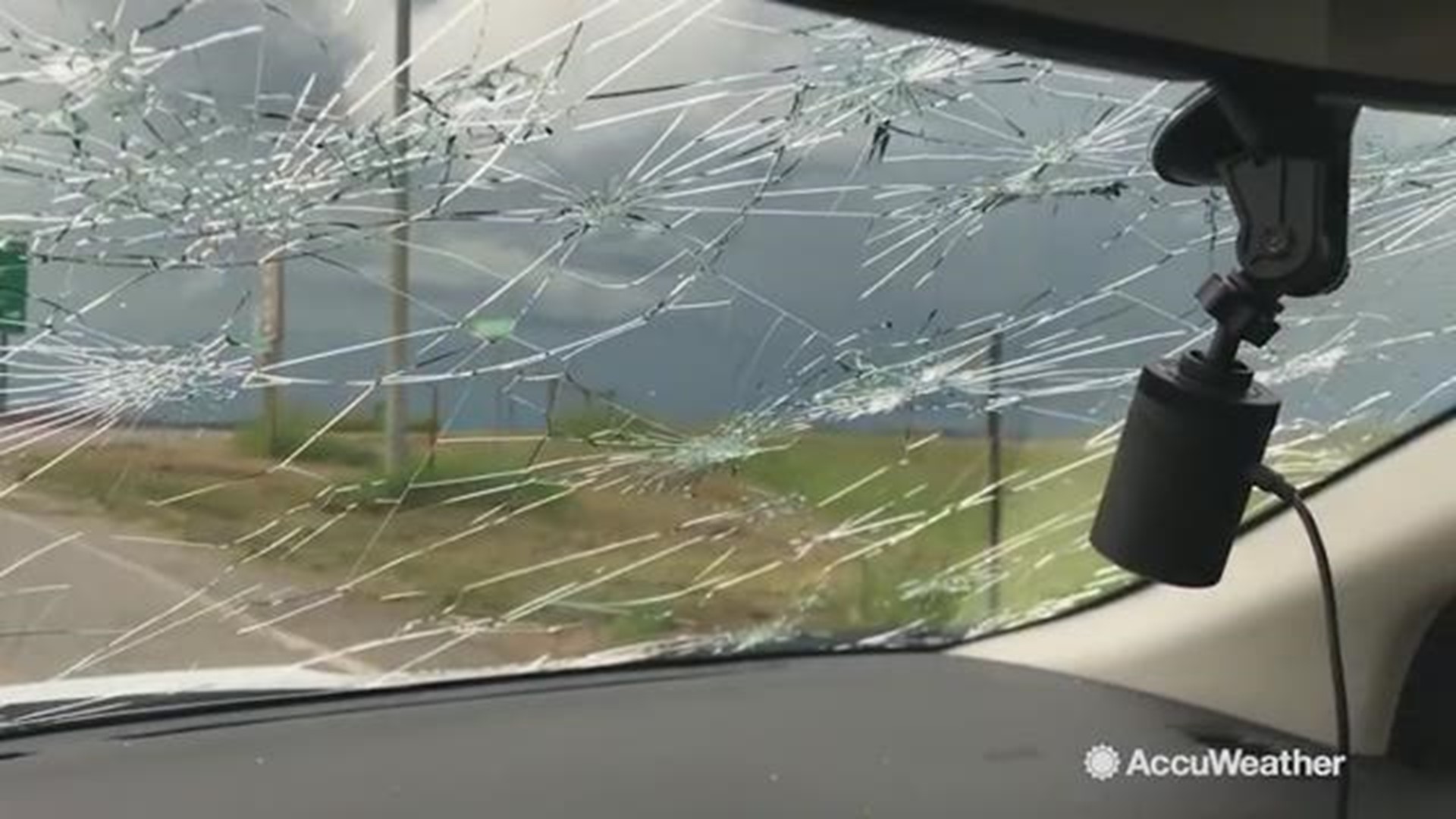 Hail smashes through Reed Timmer's windshield during storm chase ...