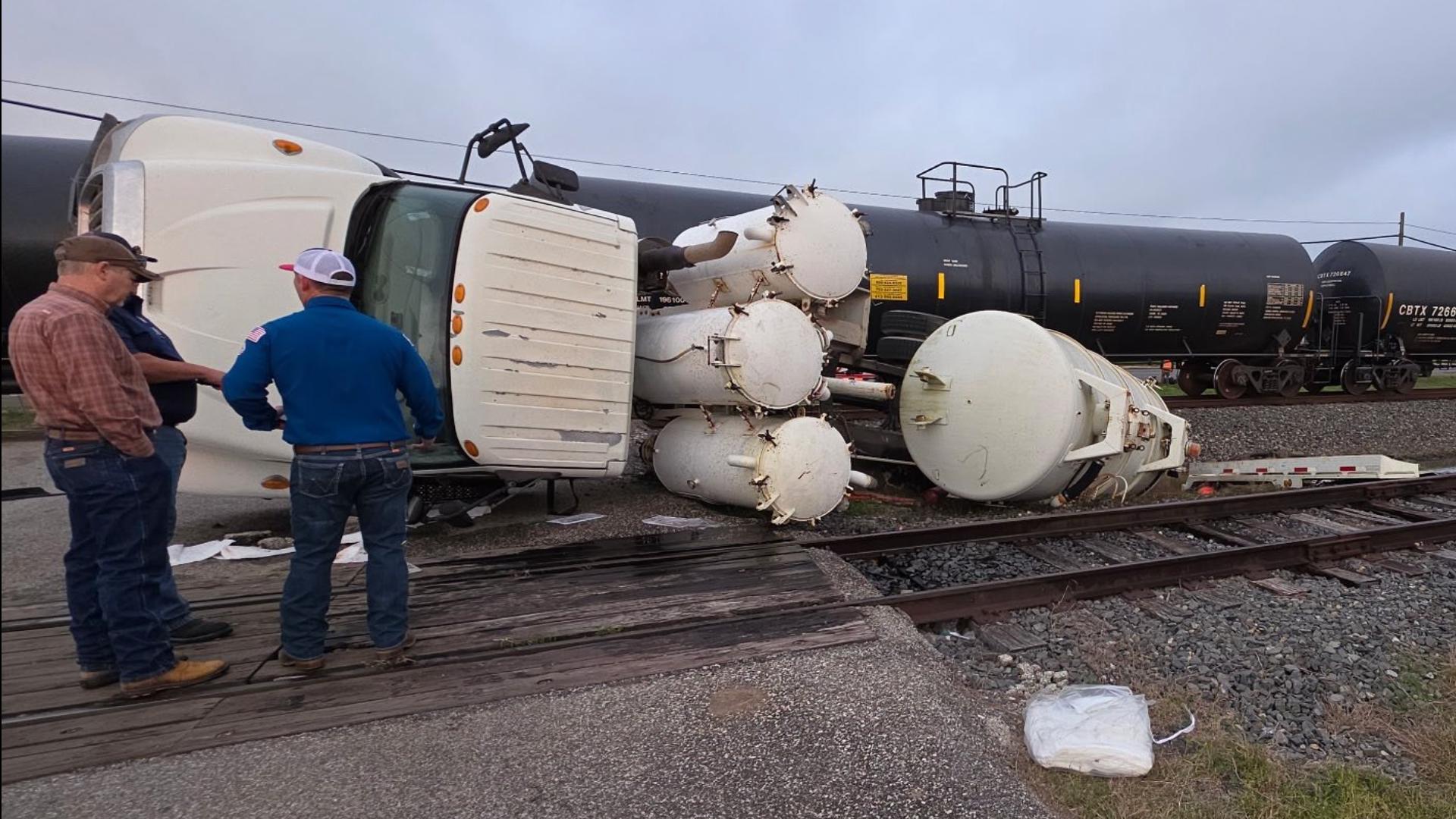 Train, tanker truck collide along Twin City Hwy Tuesday morning, driver ...