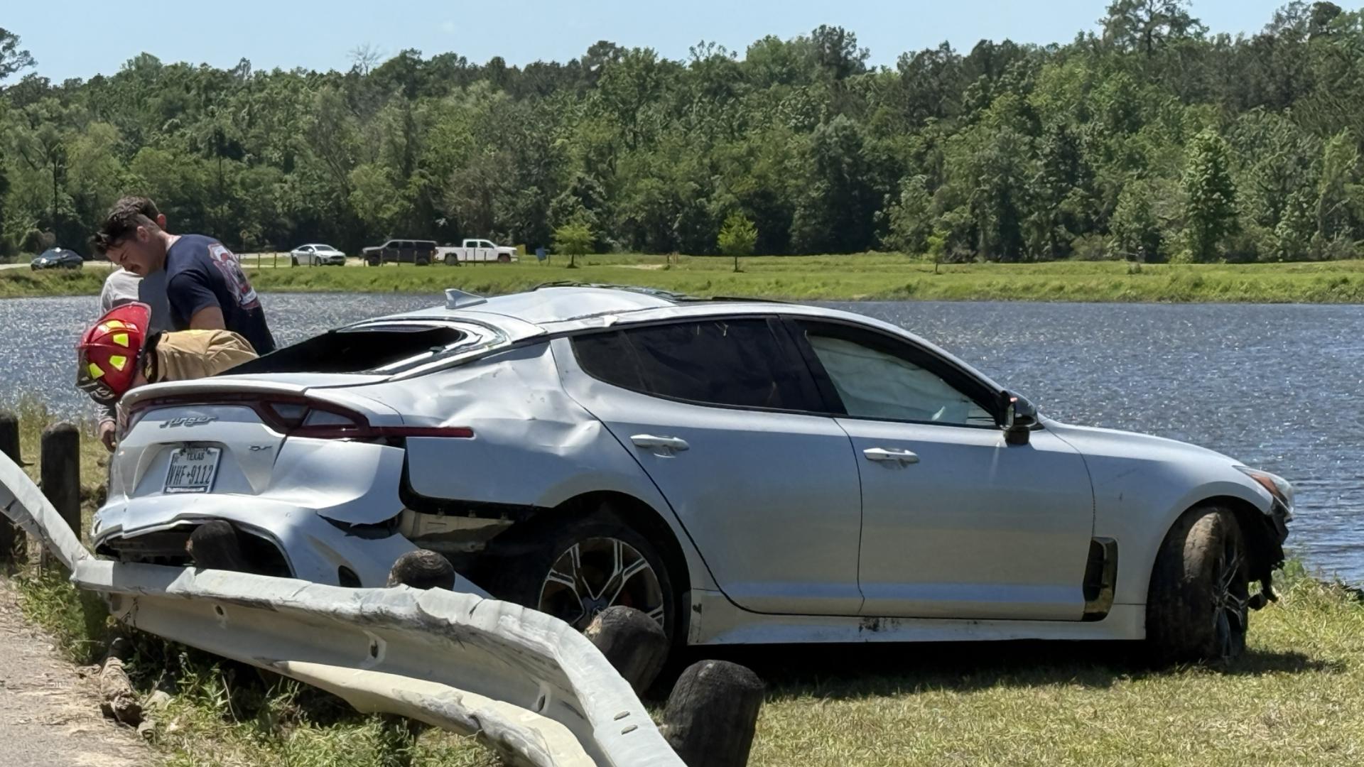 One thrown, one climbs out before car sinks in water after crash ...