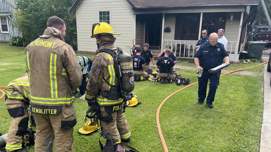 Firefighters, rescue dogs, fight house fire in Beaumont | 12newsnow.com