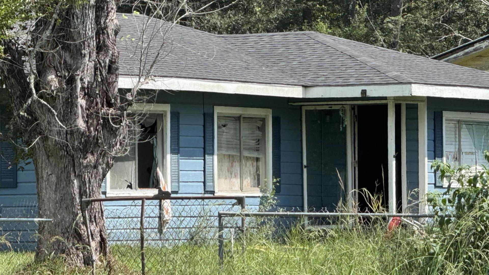 Woman injured after setting house on fire during eviction | 12newsnow.com