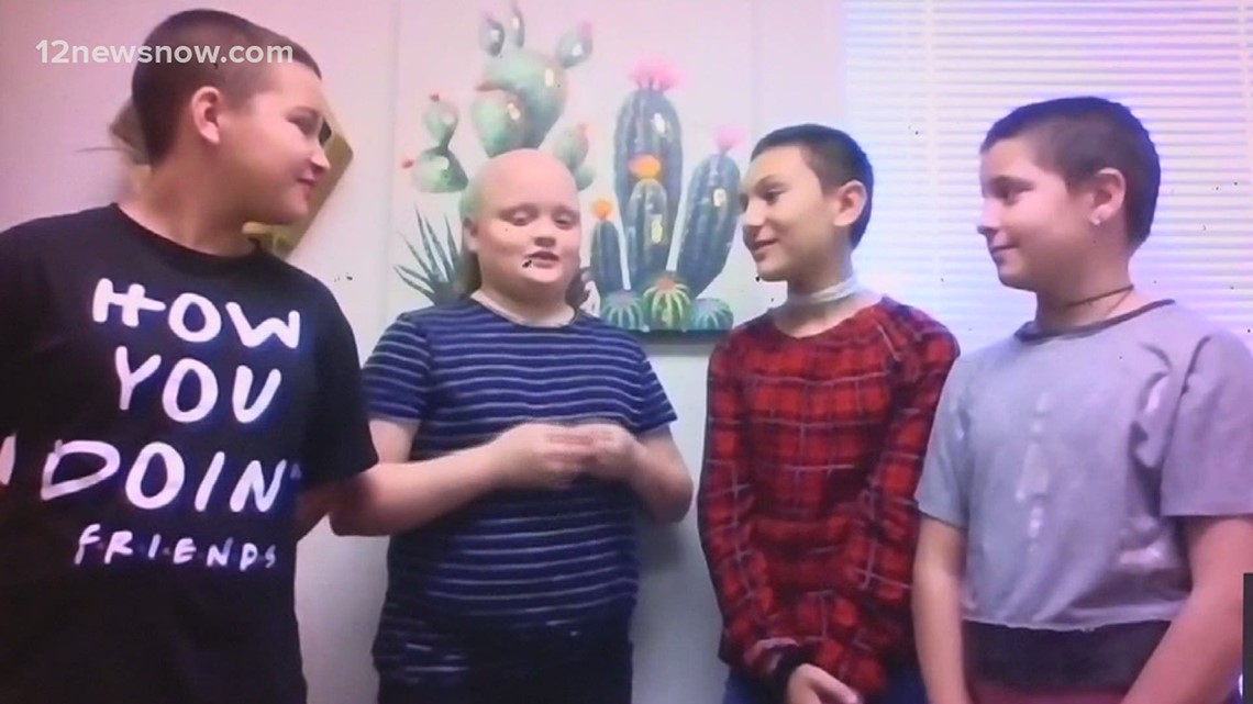 Fifth grade students shave their heads to support friend | 12newsnow.com
