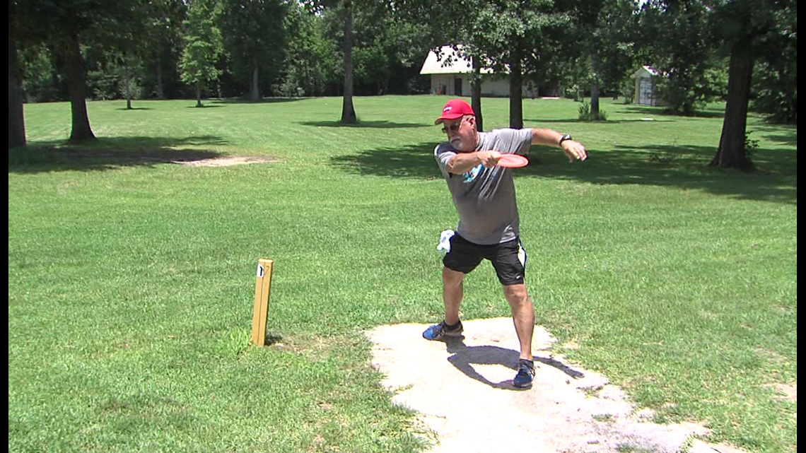 Orange disc golfer attracts competition to his dream course | 12newsnow.com